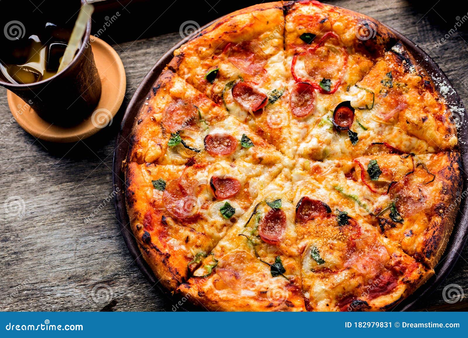 Cheese and Pepperoni Pizza with Herbs and Ice Tea Stock Image - Image ...