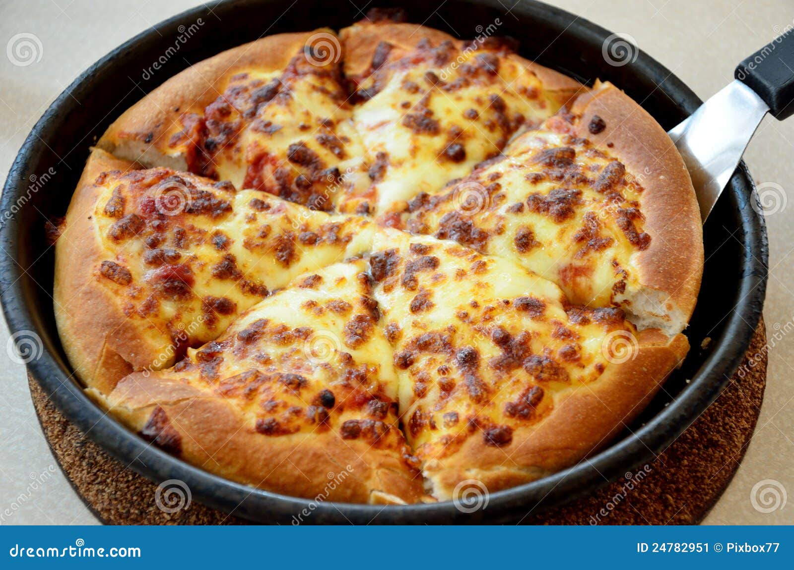 Cheese pizza in hot pan stock image. Image of table, cheese - 24782951