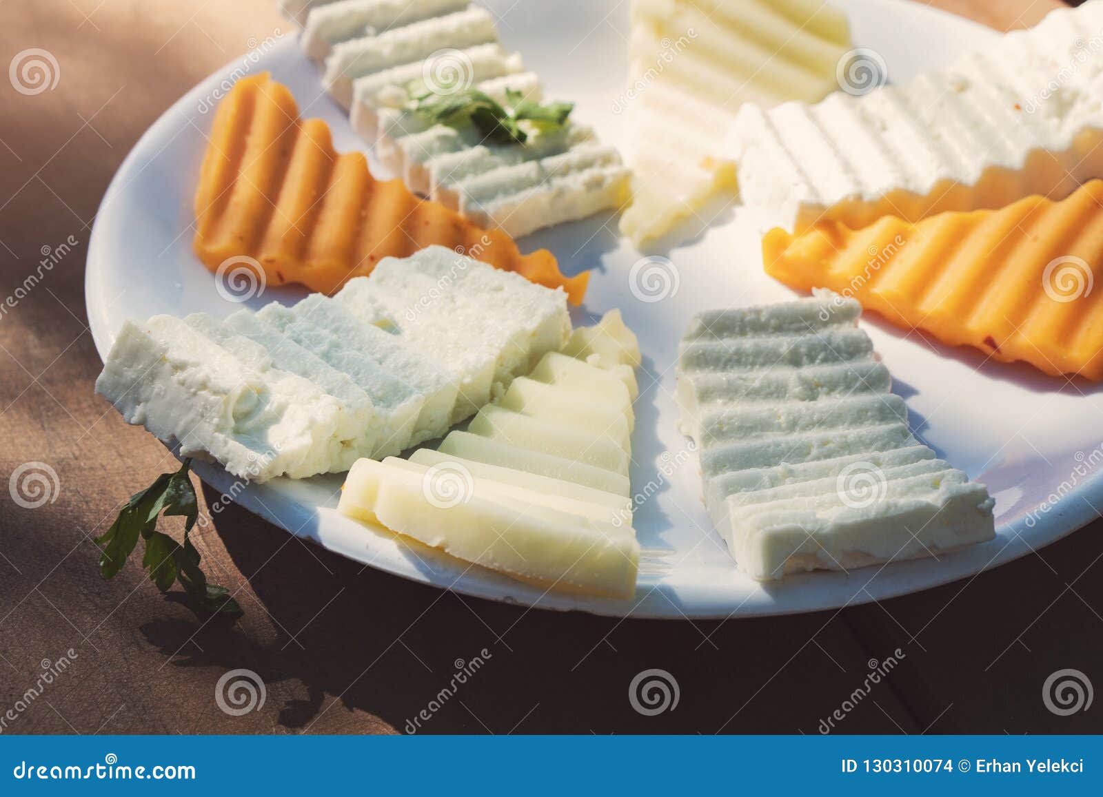 Cheese Plate with Different Colors and Flavors Stock Photo - Image of ...