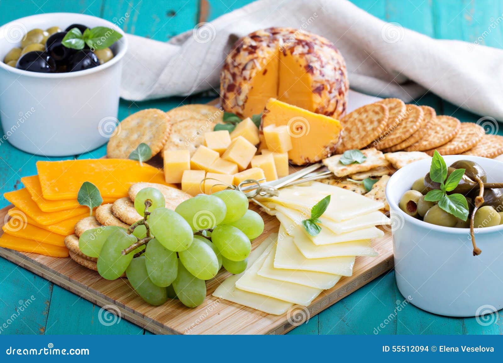 Cheese plate on a table stock photo. Image of eating - 55512094