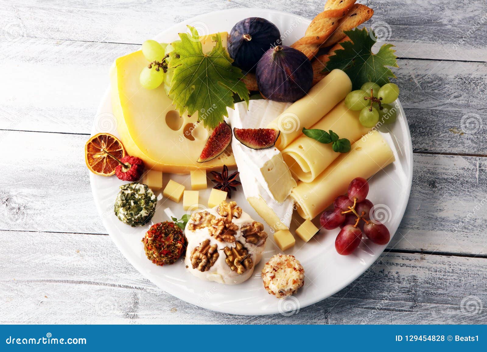 Cheese Platter with Different Cheese and Grapes. Stock Photo - Image of ...