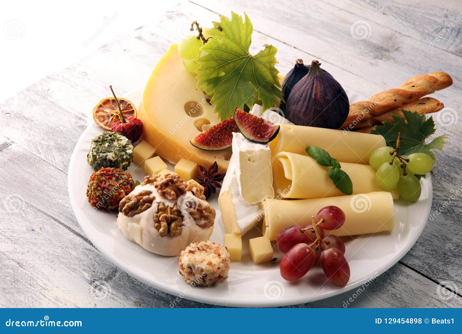 Cheese Platter with Different Cheese and Grapes. Stock Photo - Image of ...
