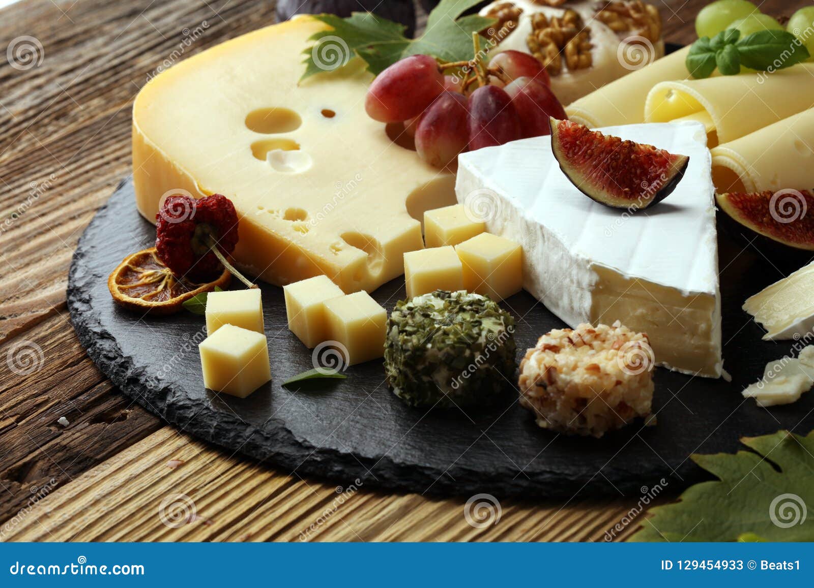 Cheese Platter with Different Cheese and Grapes. Stock Image - Image of ...