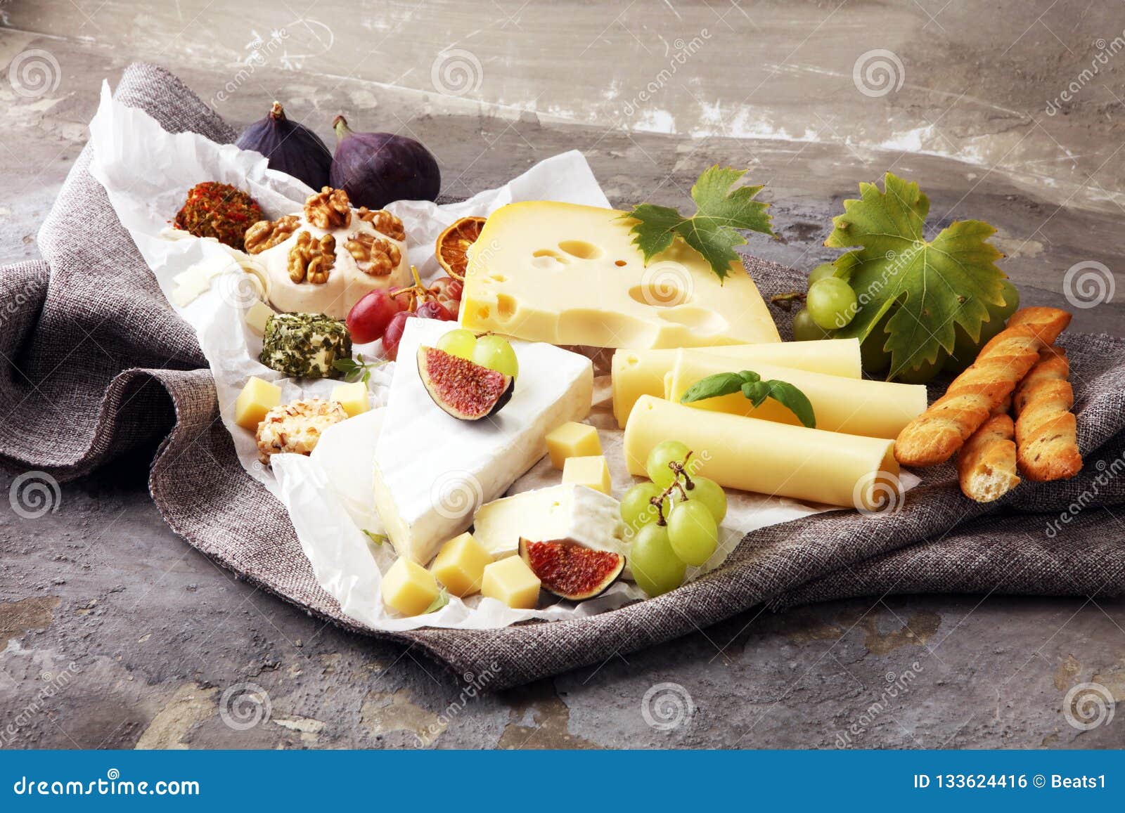 Cheese Platter with Different Cheese and Grapes Stock Photo - Image of ...