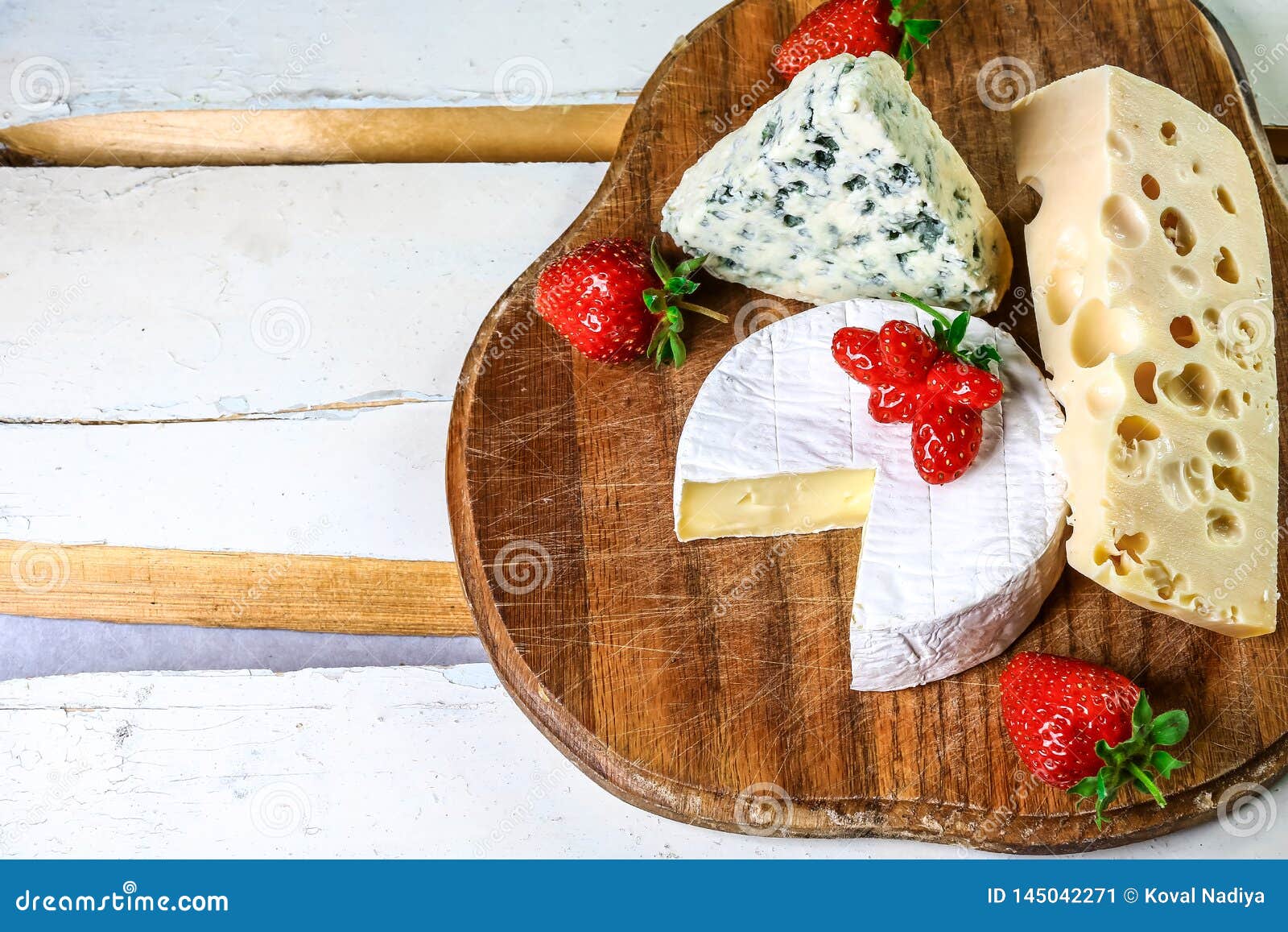 Cheese Platter with Different Cheeses Camembert with Strawberry ...
