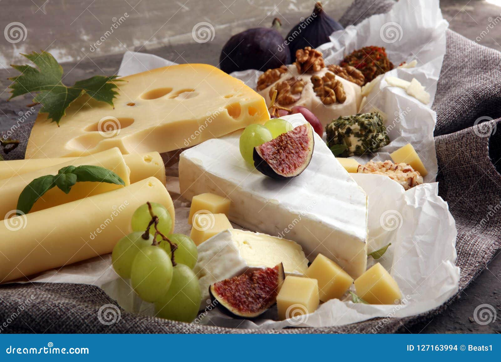 Cheese Platter with Different Cheese and Grapes. Stock Photo - Image of ...