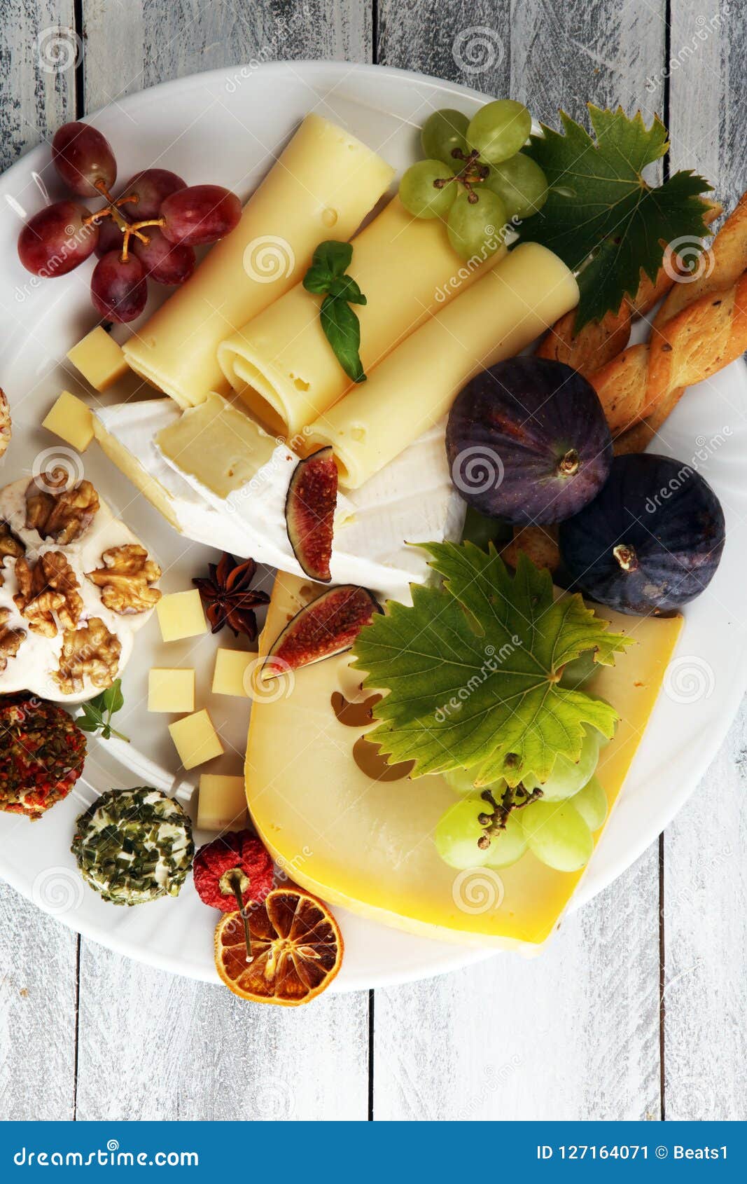 Cheese Platter with Different Cheese and Grapes. Stock Image - Image of ...