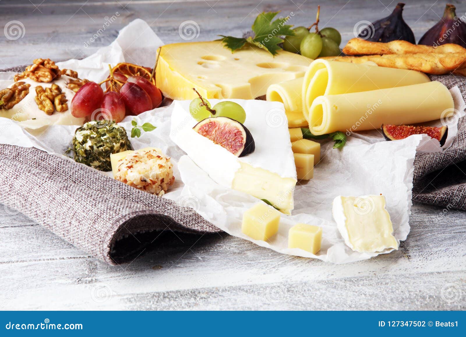 Cheese Platter with Different Cheese and Grapes. Stock Photo - Image of ...