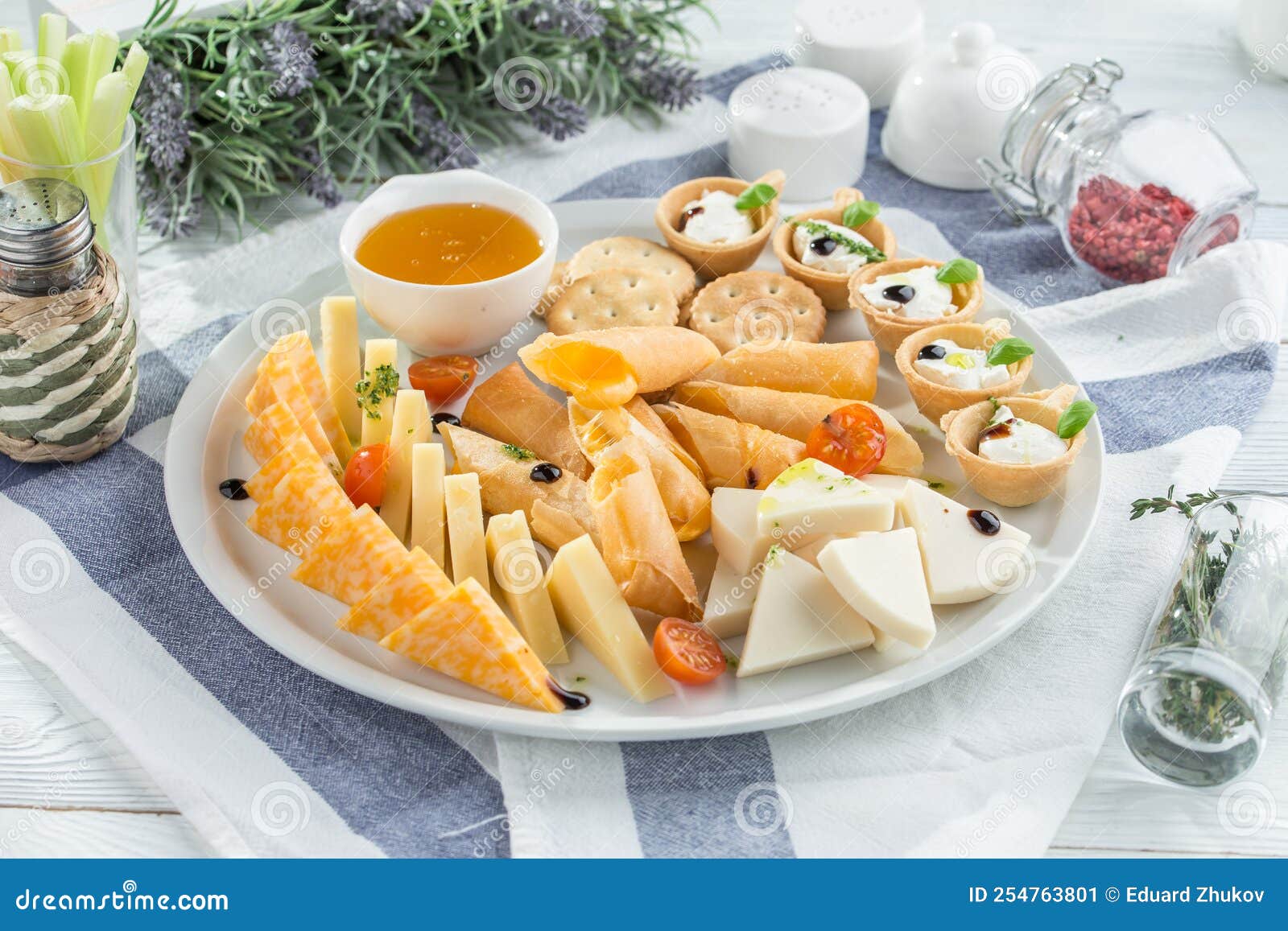 Cheese Platter with Different Cheese and Honey Festive Gourmet ...