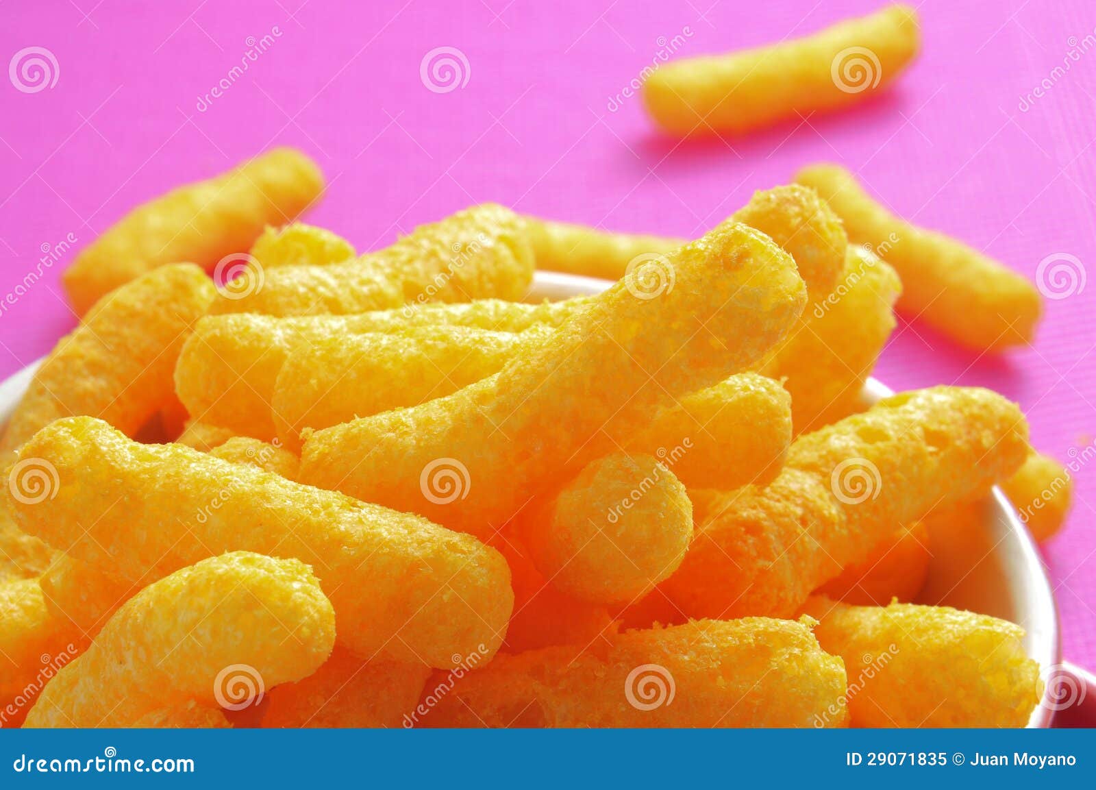 Cheese Puffs, Colorful Cheetos. Close Up Shot Of Cheese Puffs ...