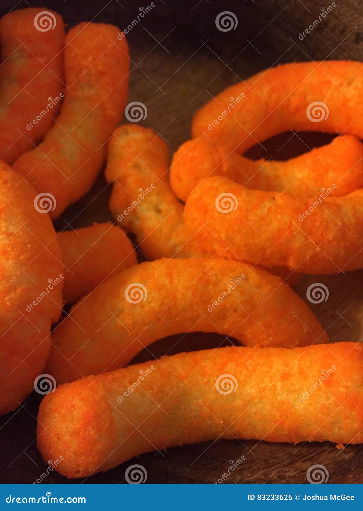 Cheese Puffs, Colorful Cheetos. Close Up Shot Of Cheese Puffs ...