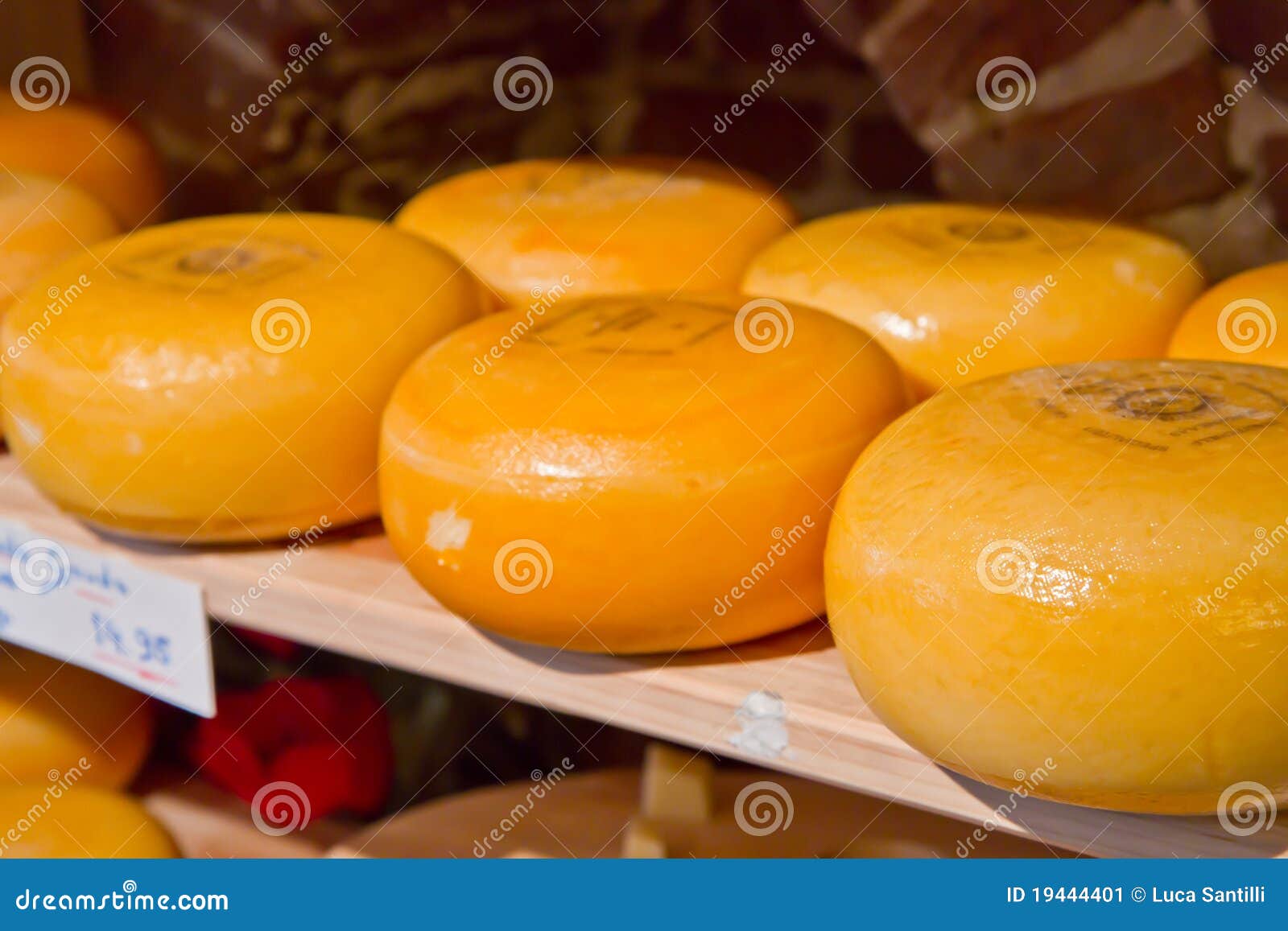 Cheese rounds stock image. Image of cheese, gouda, shelf - 19444401