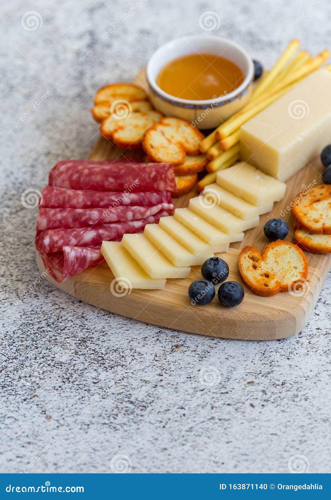 Cheese and salami stock photo. Image of bread, plate - 163871140