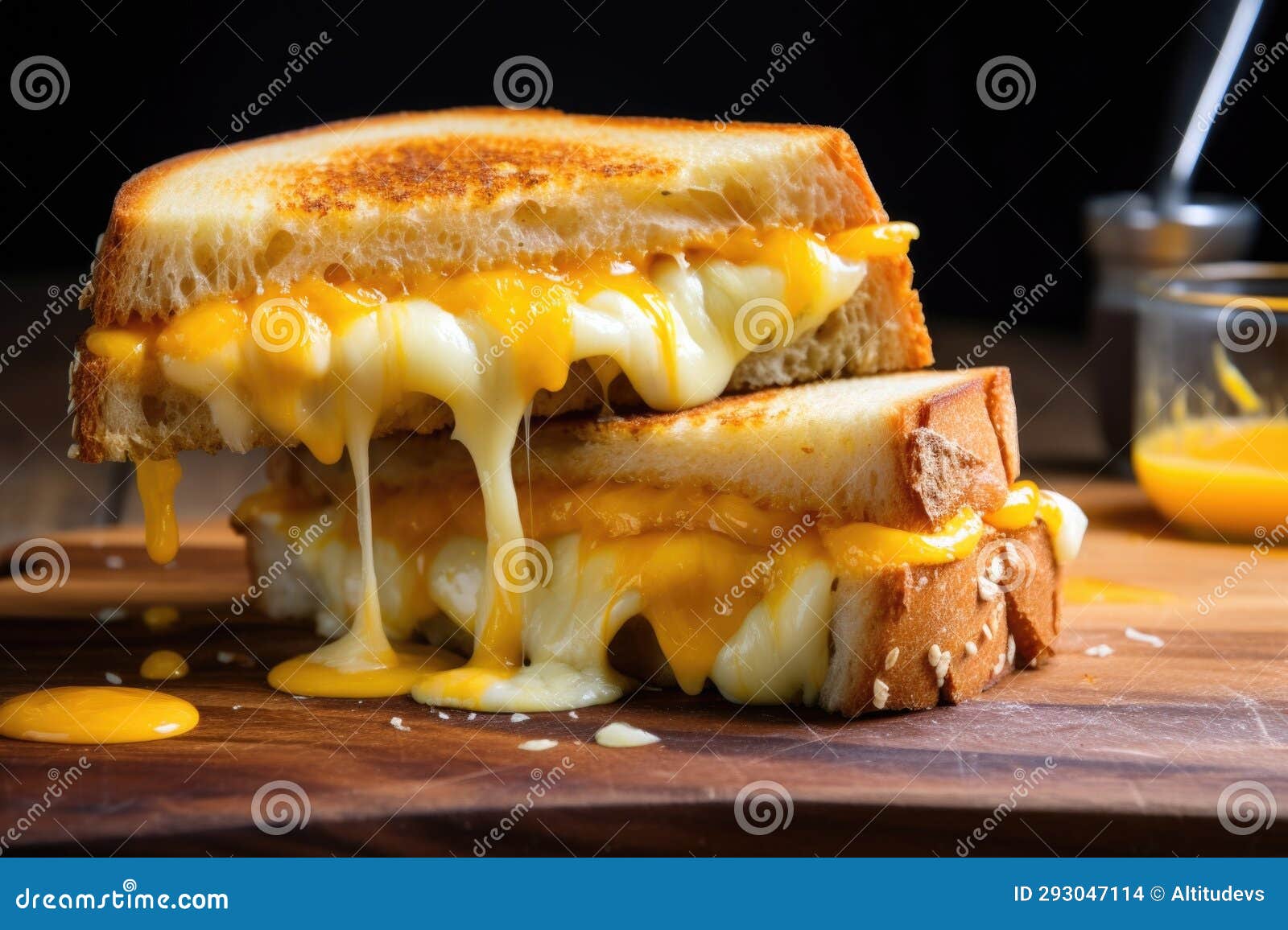 Cheese Sandwich with Gooey Cheese Dripping Down the Sides Stock Photo ...