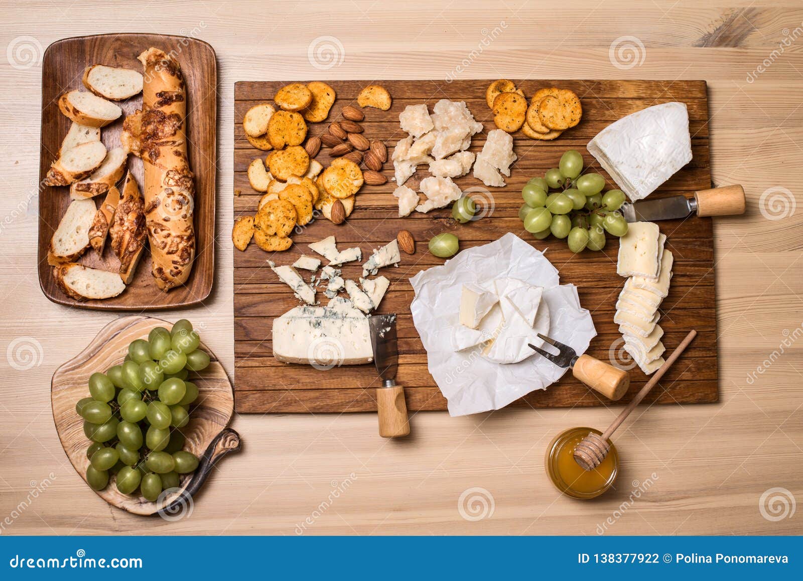 Cheese Selection on Wooden Rustic Board. Cheese Platter with Different ...