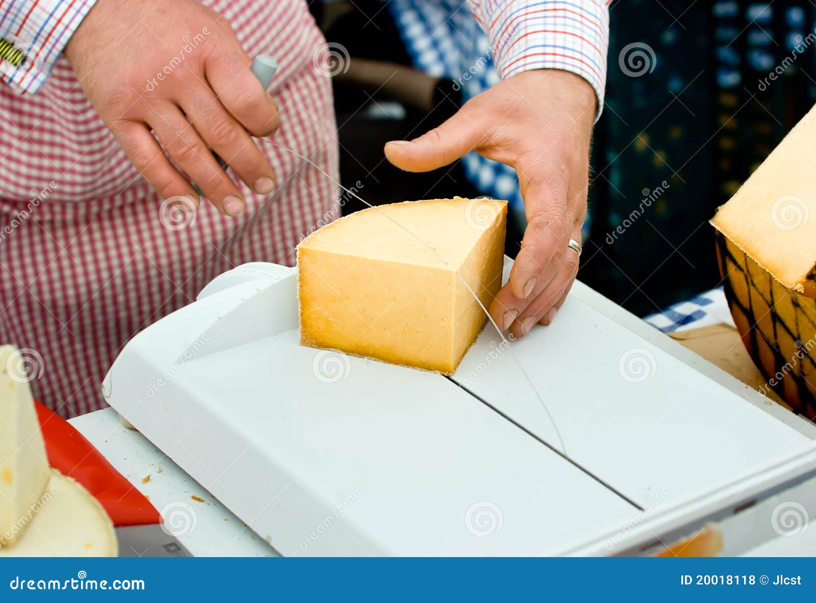 Cheese Slicing. stock photo. Image of delicatessen, male - 20018118
