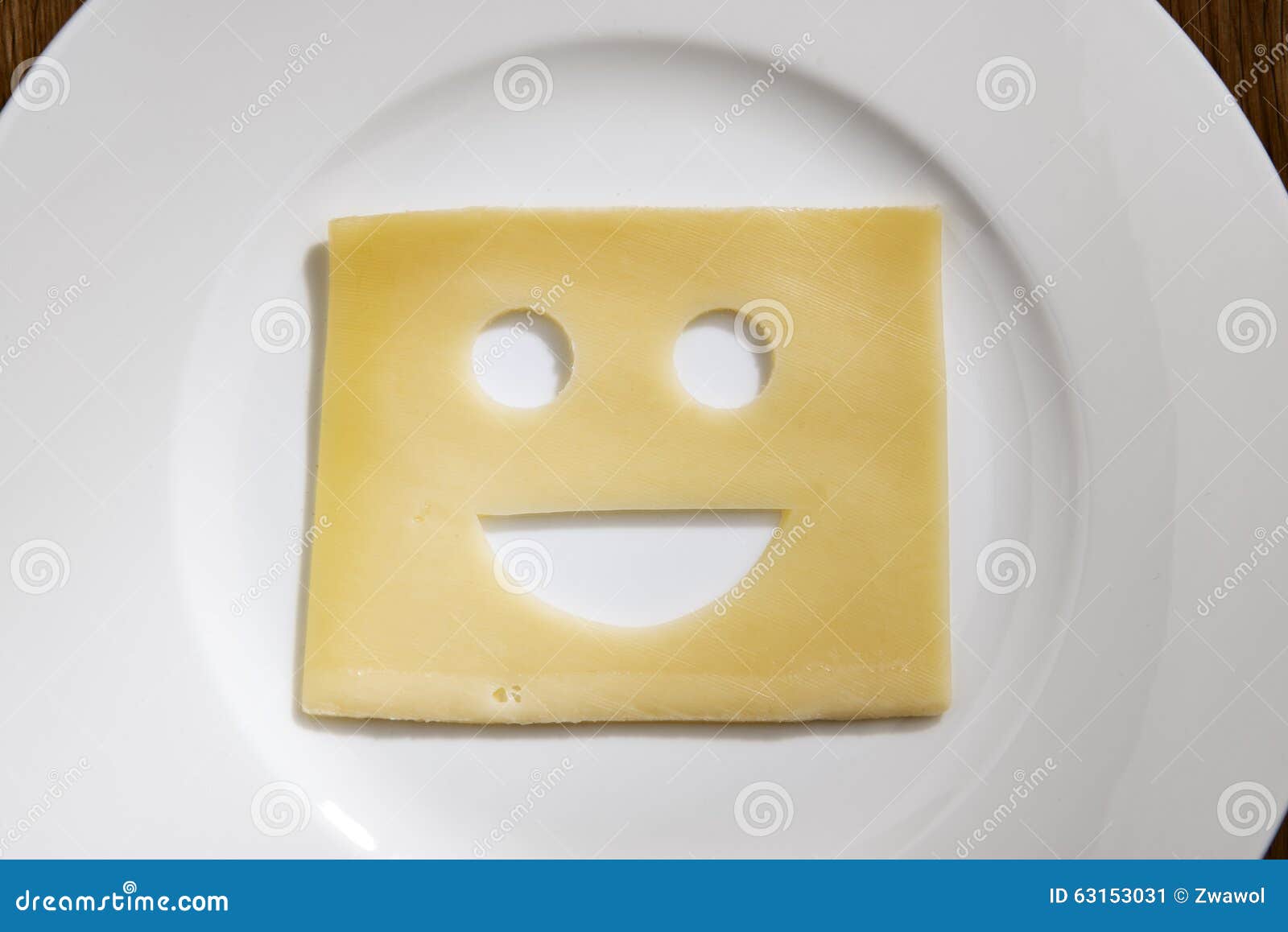 Cheese with Smiling Face on a Table Stock Image - Image of selective ...
