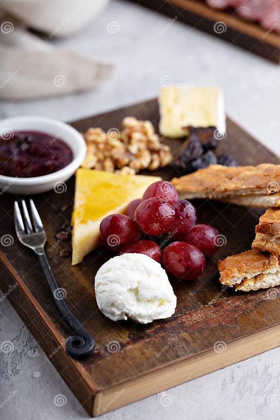 Cheese snack plate with stock image. Image of delicatessen - 174686375