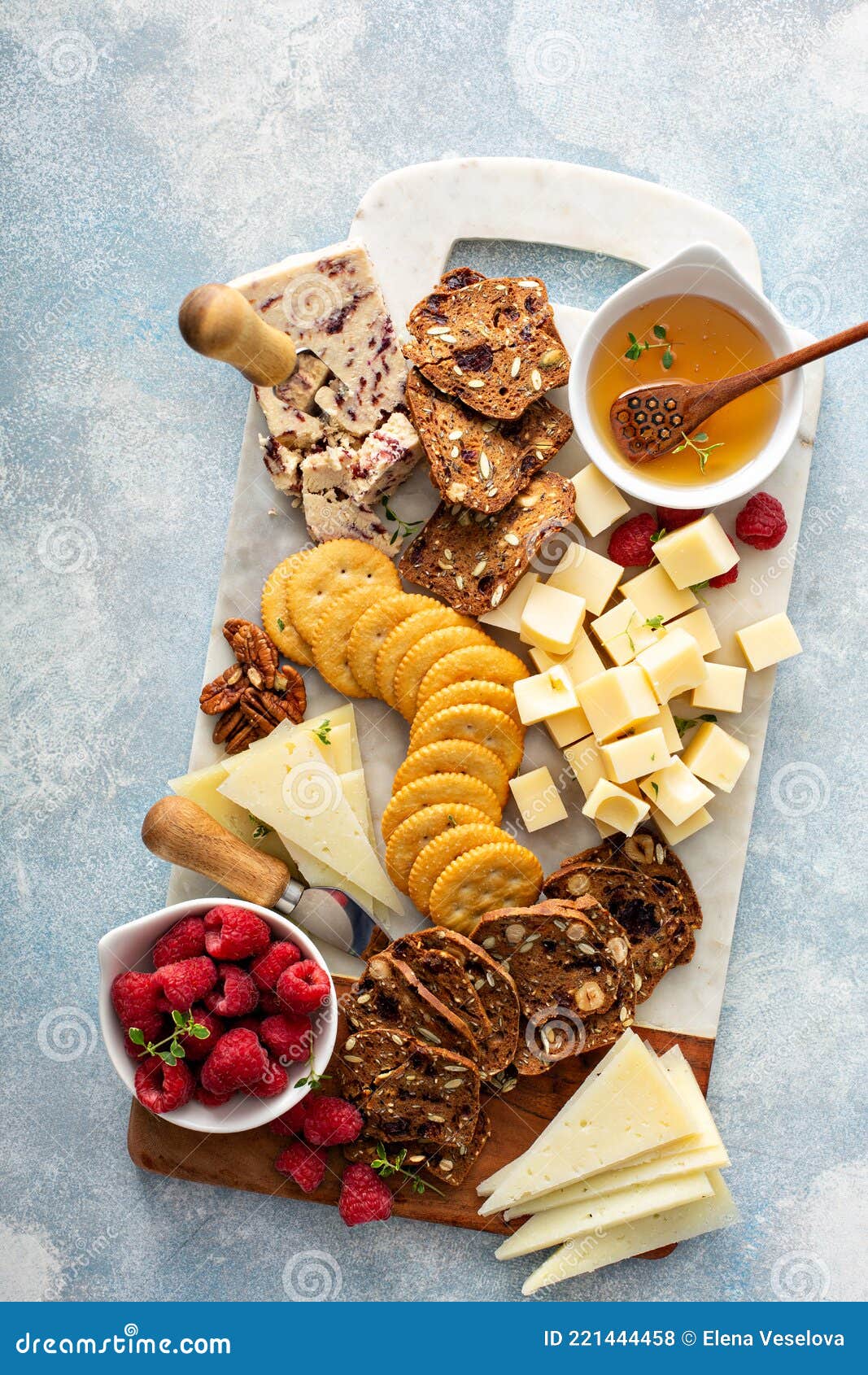 Cheese and Snacks Board with Raspberry and Crackers Stock Photo - Image ...