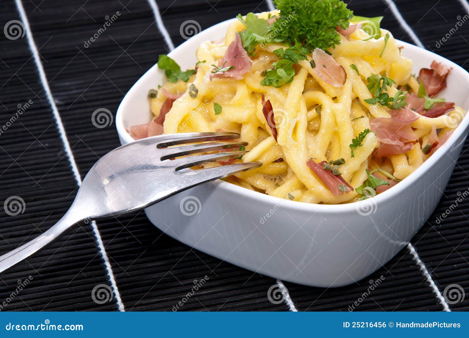 Cheese Spaetzle in a Bowl (on Black) Stock Photo - Image of black, bowl ...