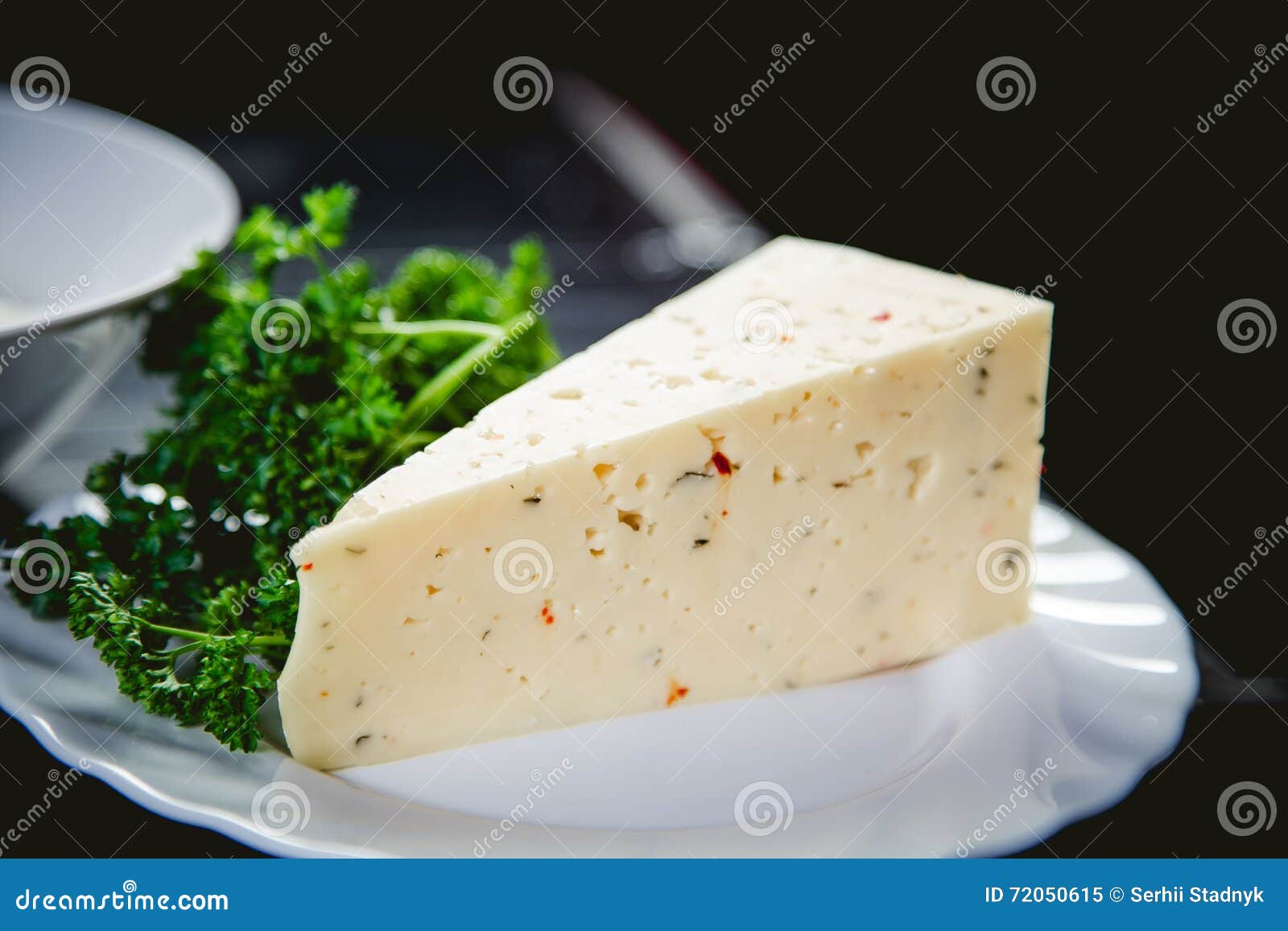 Cheese with Spices, a Triangle of Cheese and Parsley Stock Image ...