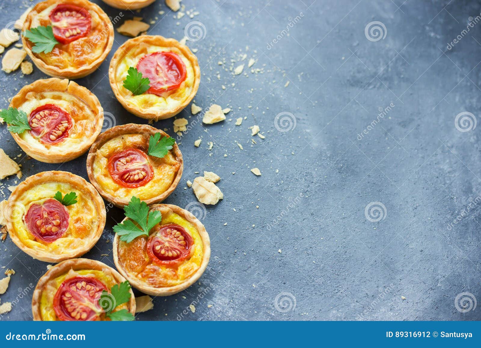 Cheese and tomato tartlets stock photo. Image of diet - 89316912