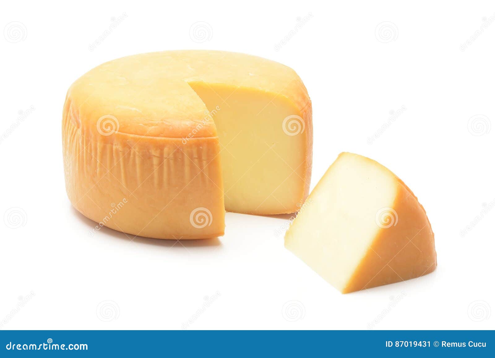 Cheese Wheel with a Piece of Cheese on a White Background. Stock Image ...