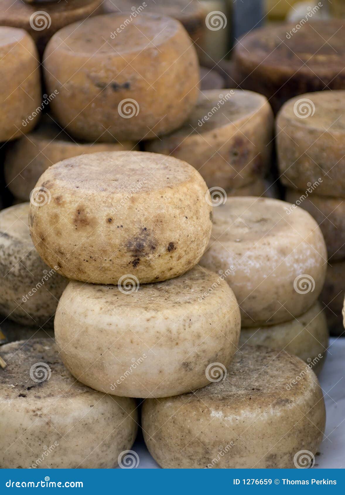 Cheese wheels stock image. Image of food, pile, wheel - 1276659