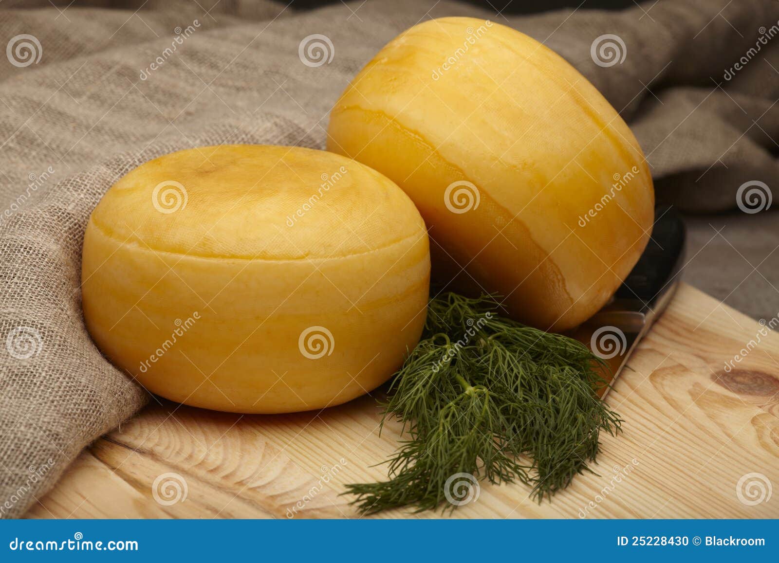 Cheese wheels stock photo. Image of head, knife, wheel - 25228430