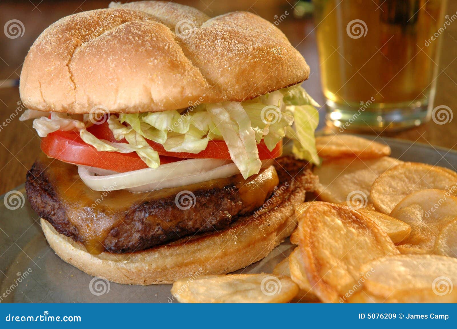 Cheeseburger and a beer stock image. Image of cheeseburger - 5076209