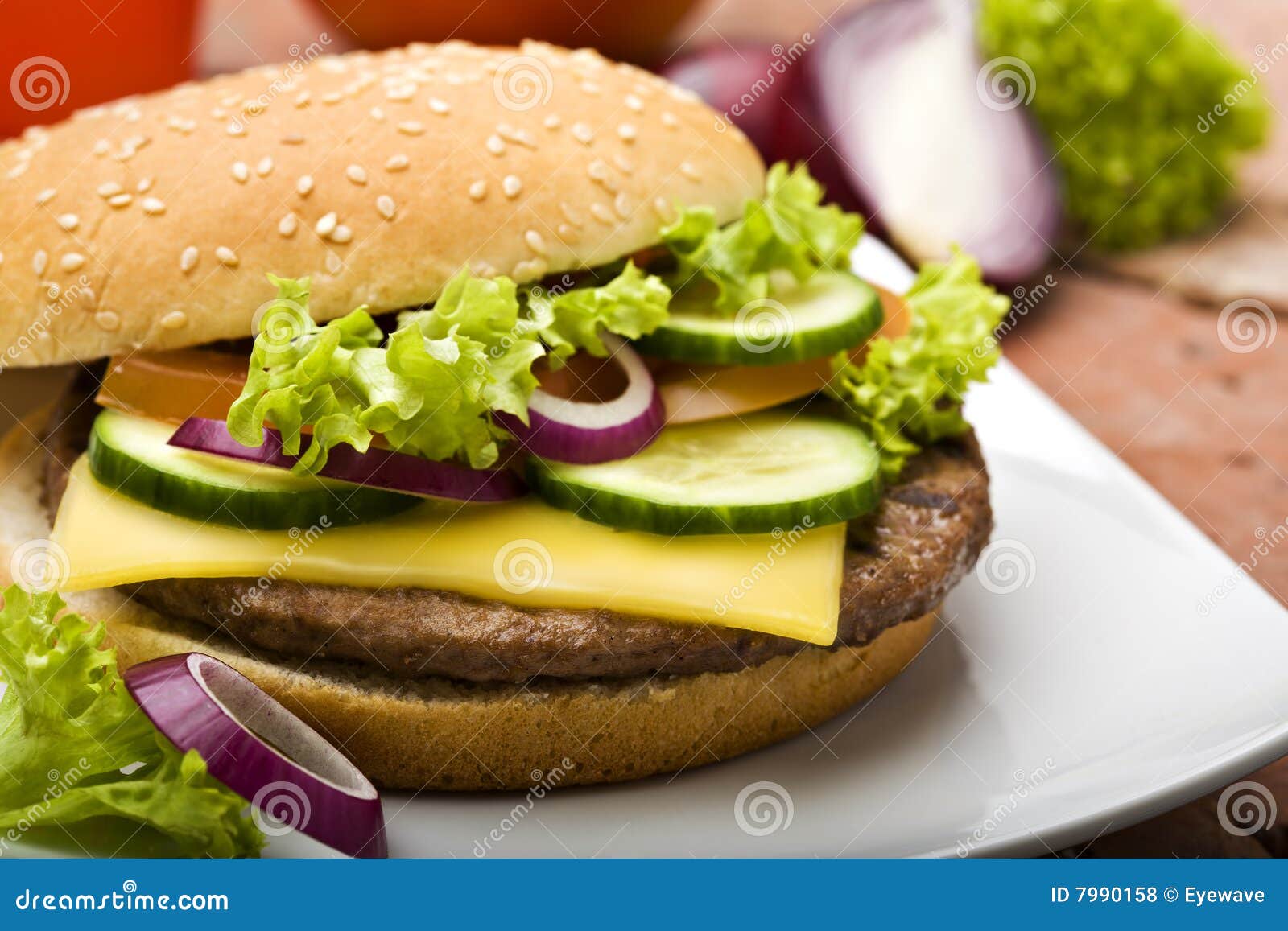 Cheeseburger close-up stock photo. Image of meal, onions - 7990158