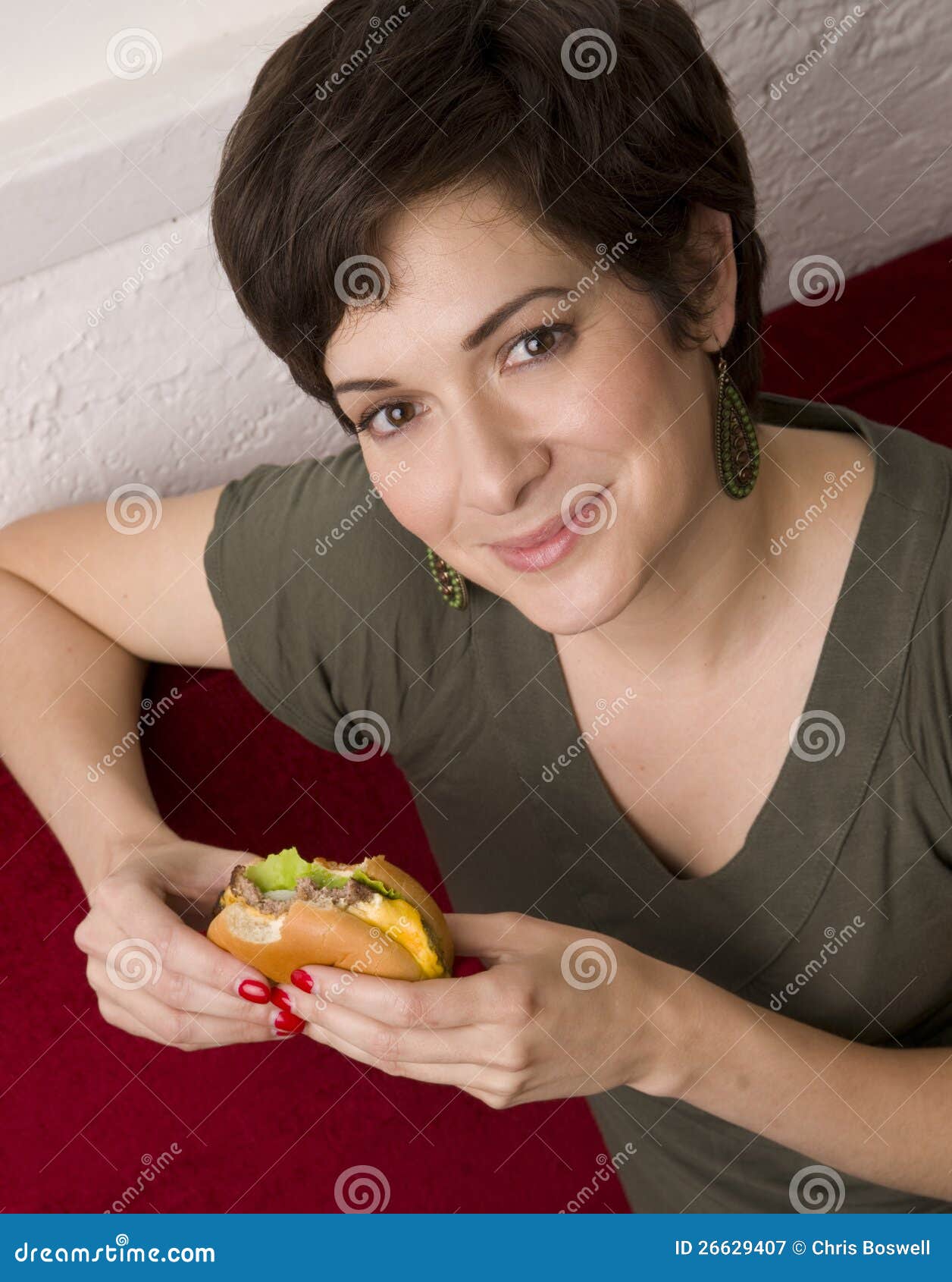 Woman Holds Cheeseburger between Bites Eating Stock Image - Image of ...