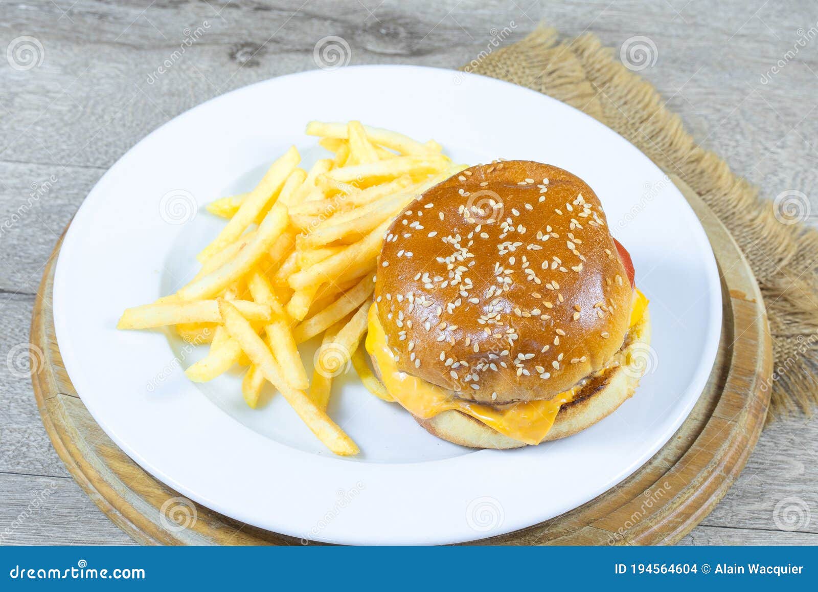 Cheeseburger and Fries on a Plate Stock Photo - Image of meat ...