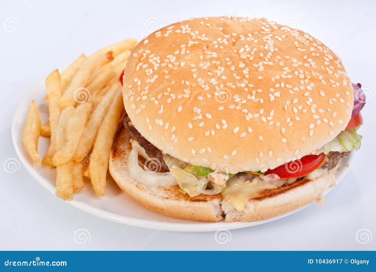 Cheeseburger with fries stock image. Image of dinner - 10436917