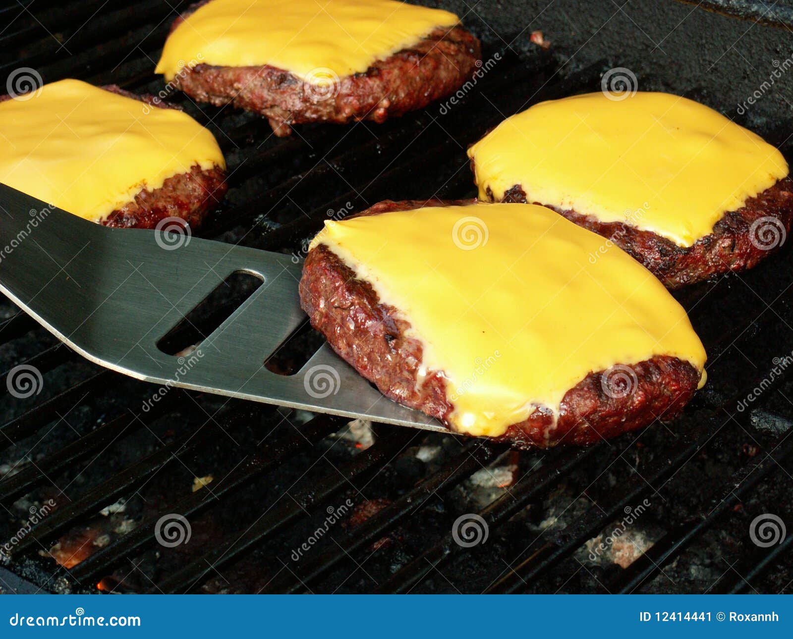 Cheeseburgers on Grill stock image. Image of cheeseburger - 12414441