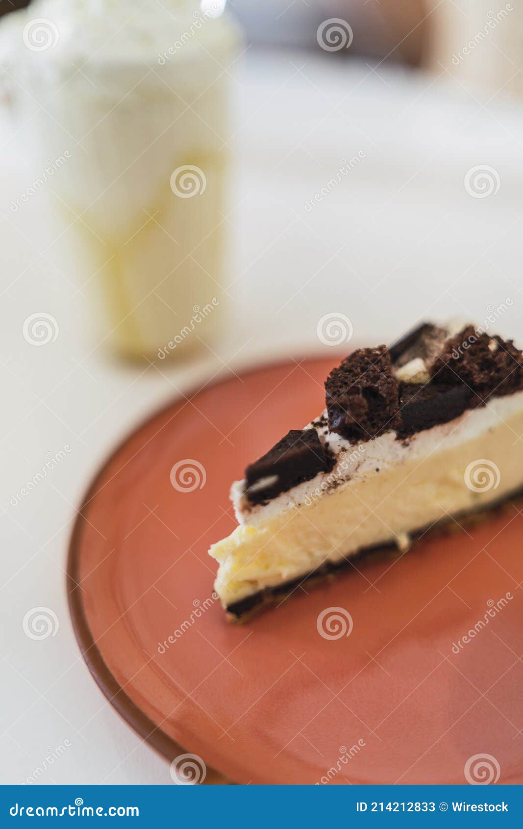 Cheesecake Piece on a Plate and a Milkshake on the Table Stock Image ...