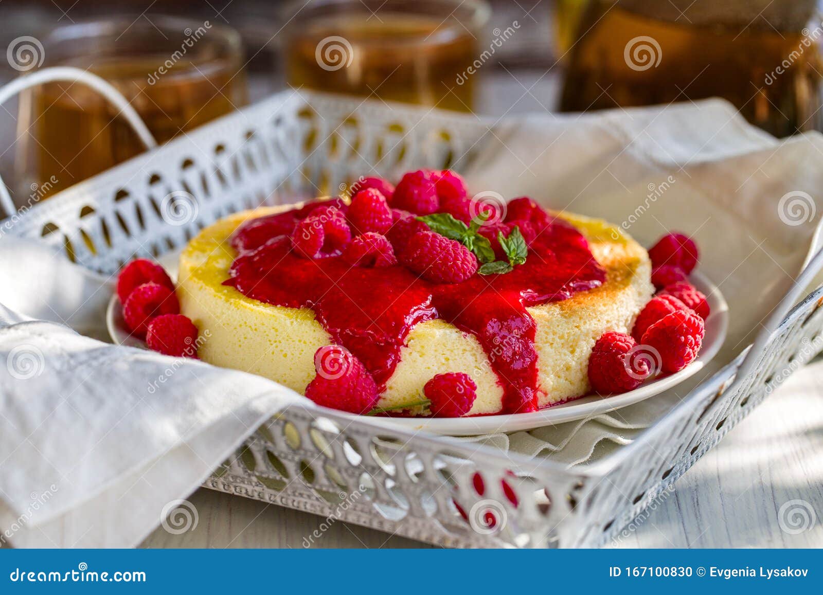 Cheesecake with Raspberry Sauce Stock Photo - Image of fruit, green ...