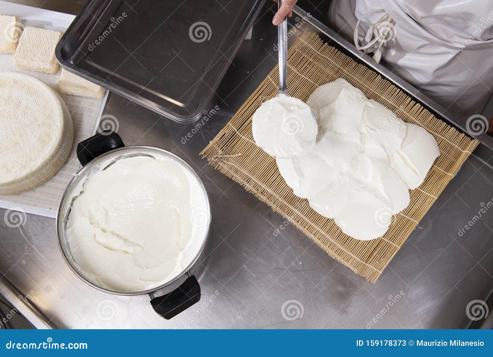 Cheesemaker Puts Fresh Cheese on the Rush for a Typical Process Stock ...