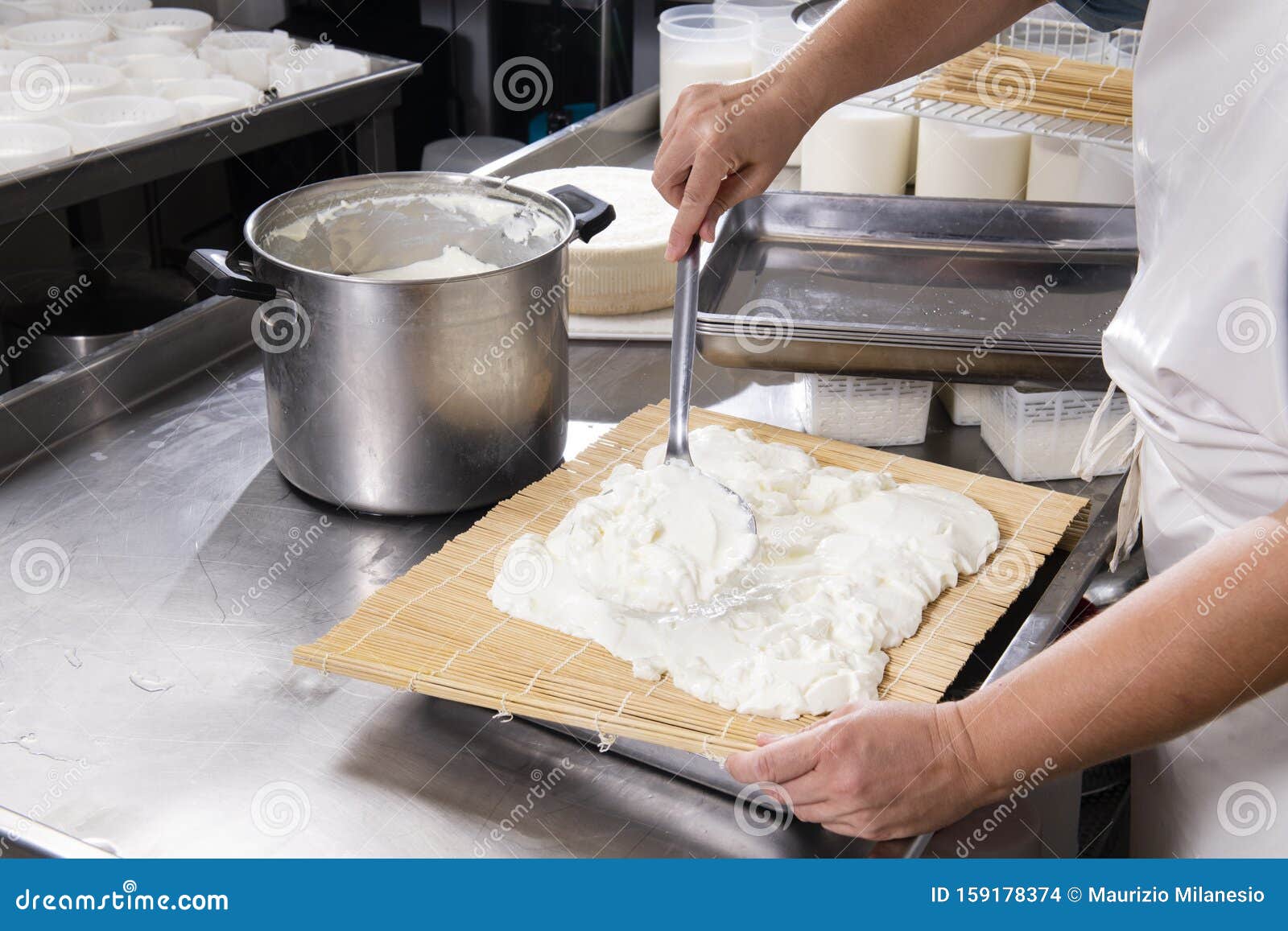 Cheesemaker Puts Fresh Cheese on the Rush for a Typical Process Stock ...