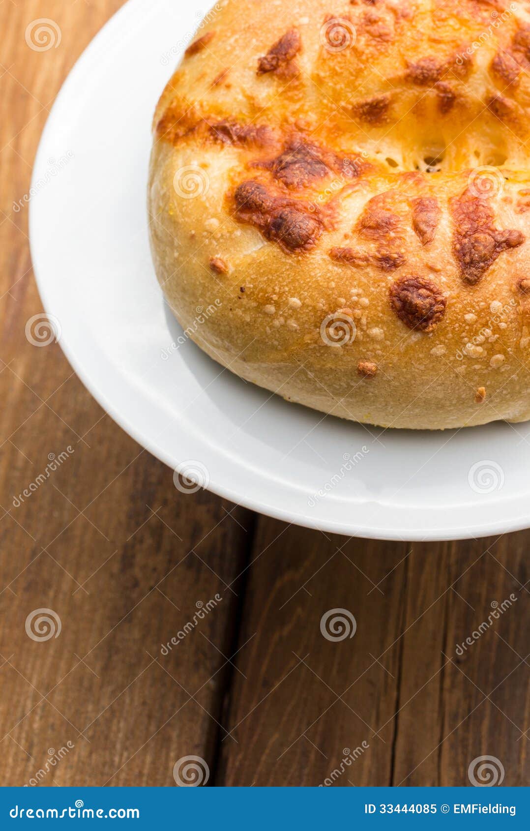 Cheesy Bagel stock image. Image of topping, eating, melted - 33444085