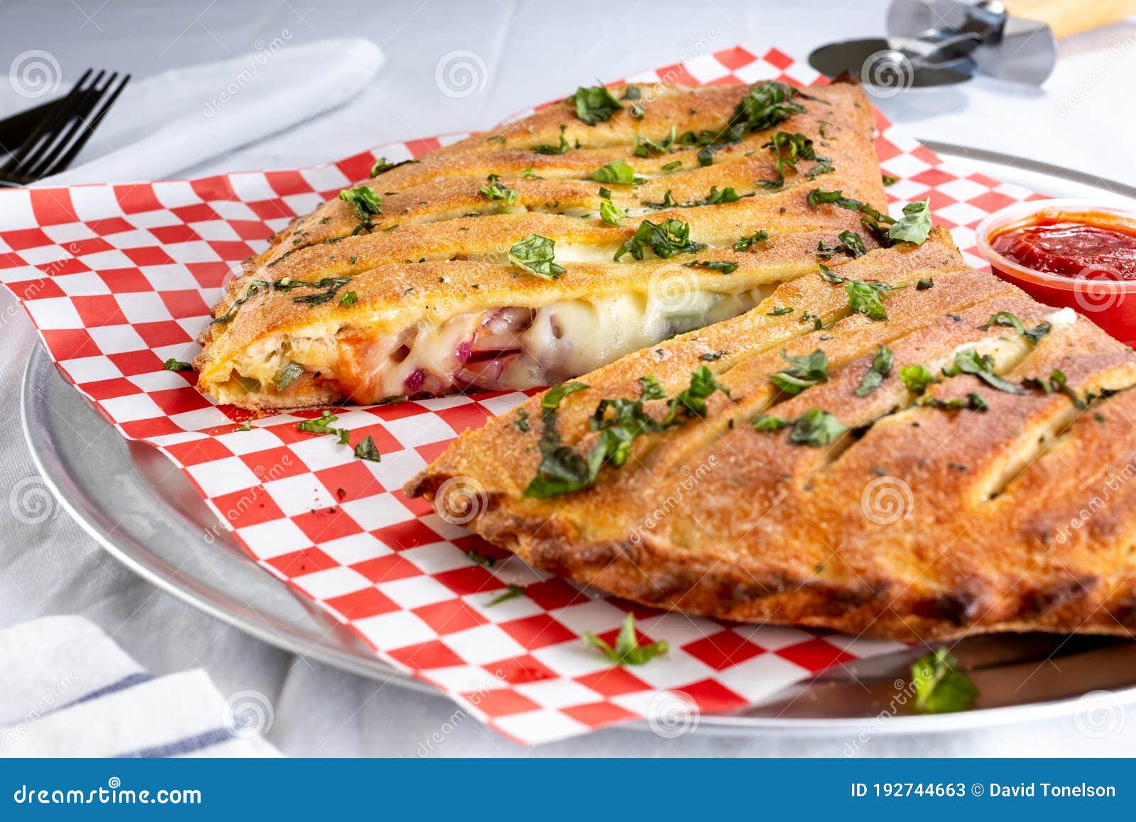 Cheesy calzone stock image. Image of background, plate - 192744663