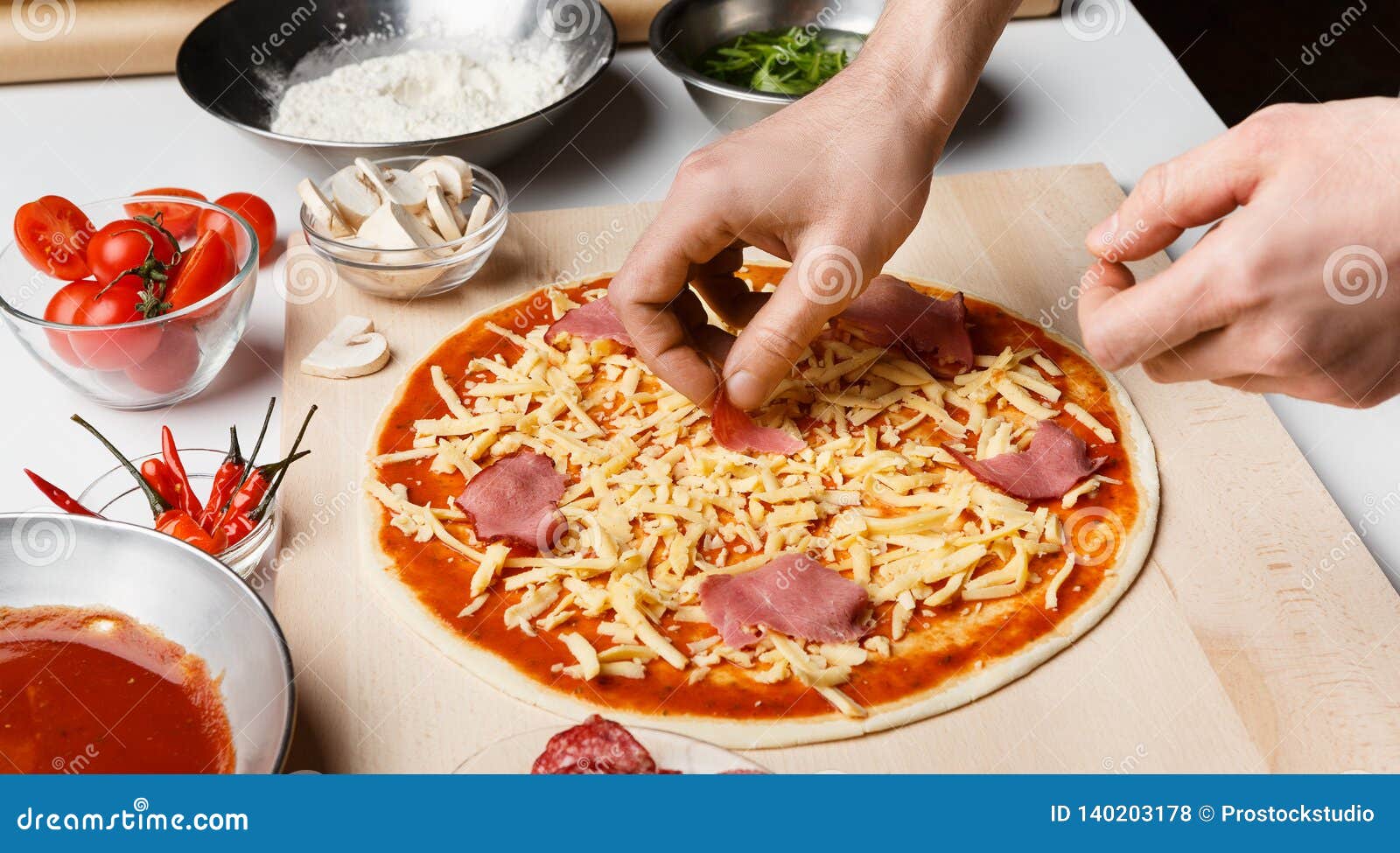 Chef Adding Ham Slices on Pizza in Restaurant Stock Photo - Image of ...