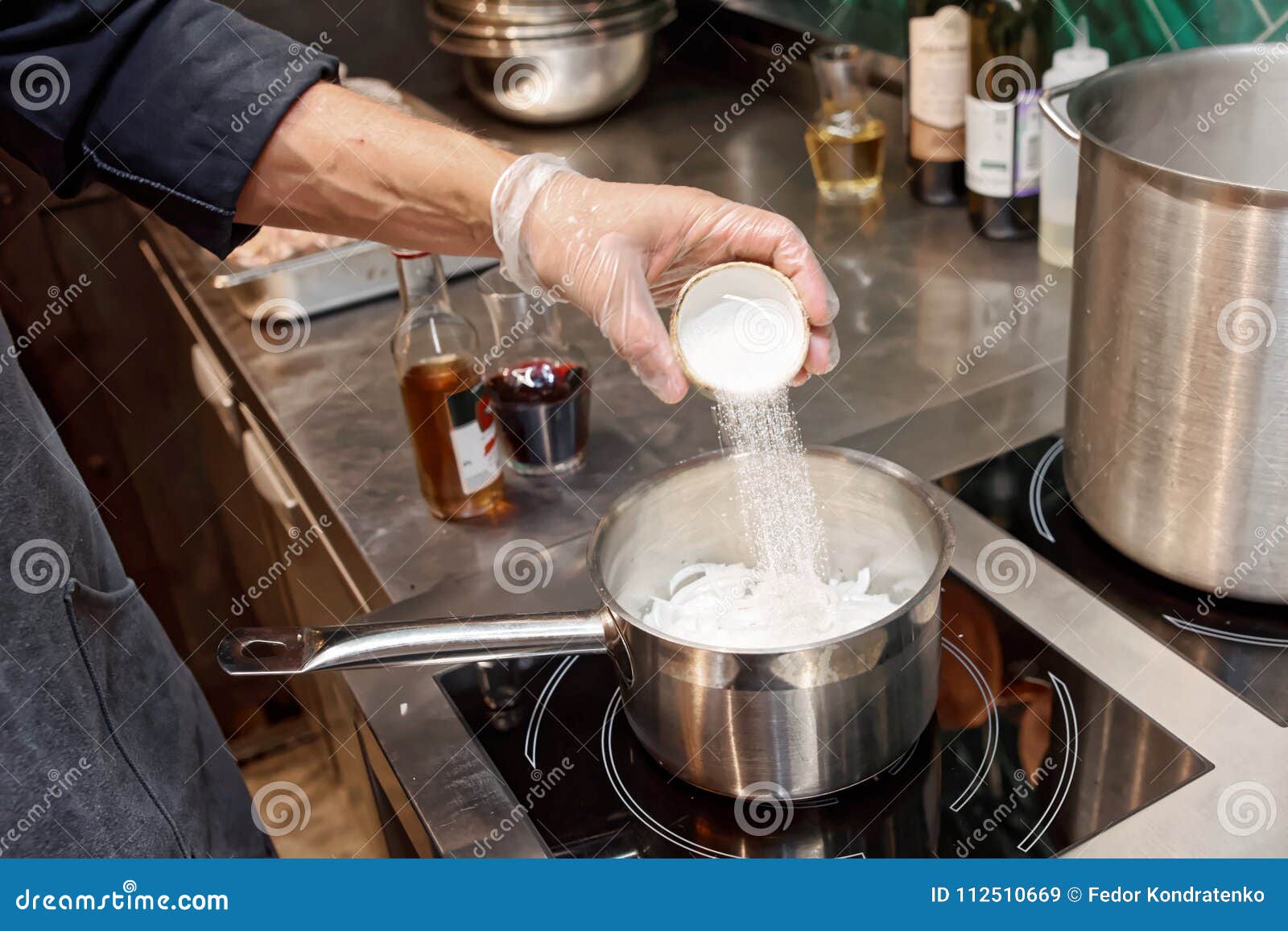 Chef is Adding Sugar To the Pan, Toned Stock Image - Image of cook ...