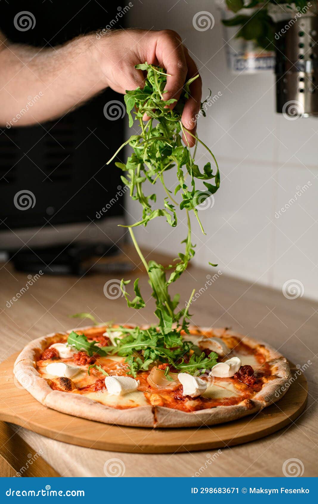 Chefs Touch. Arugula Sprinkled on a Finished Pizza Stock Image - Image ...