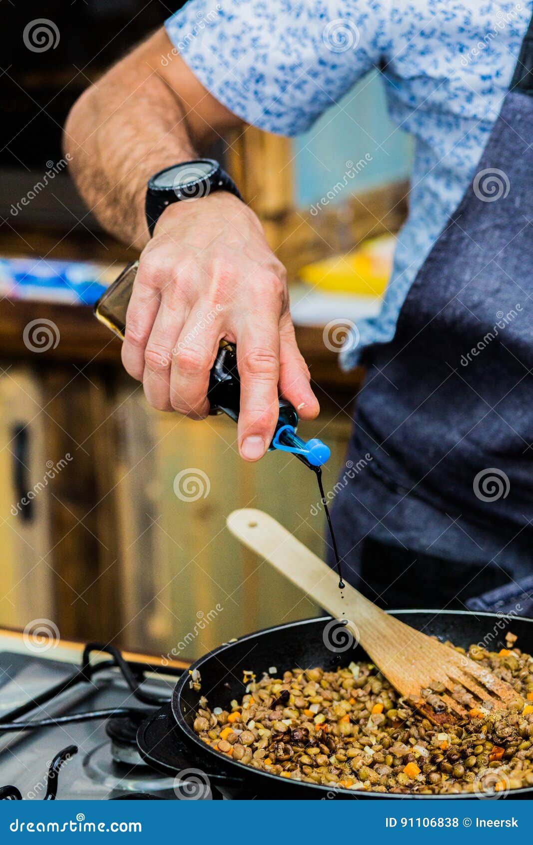 Chef Adds Ingredients To Meals Stock Photo - Image of chef, interior ...