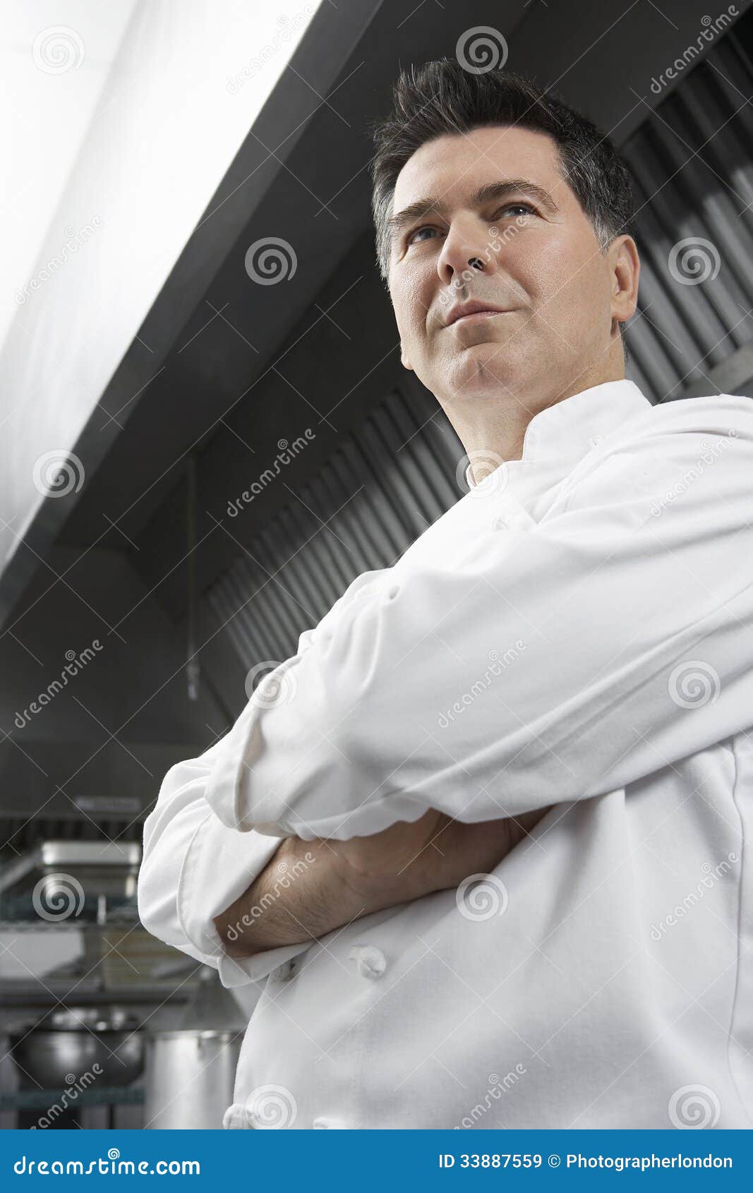 Chef with Arms Crossed in Kitchen Stock Image - Image of occupation ...