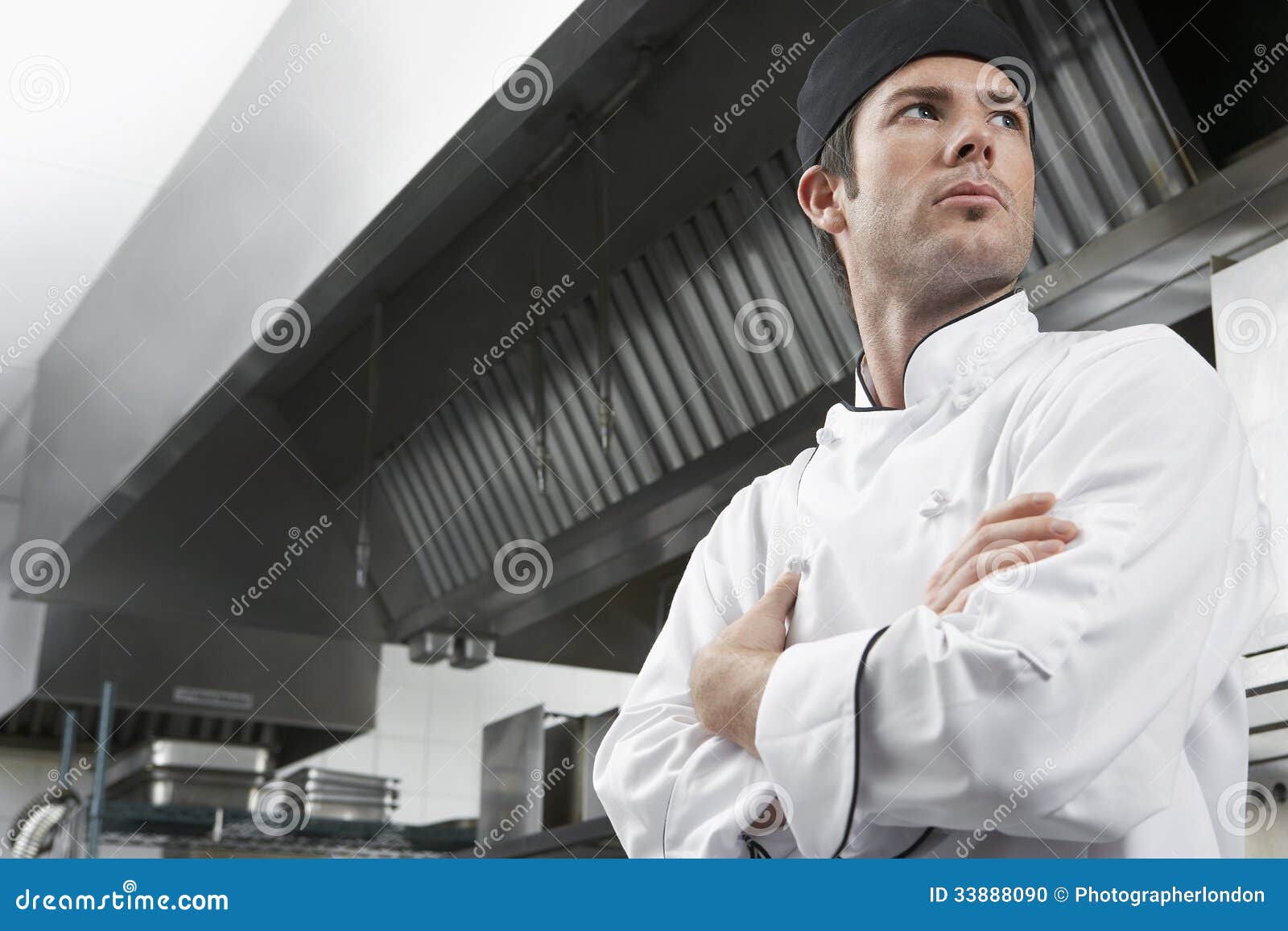Chef with Arms Crossed in Kitchen Stock Photo - Image of restaurant ...