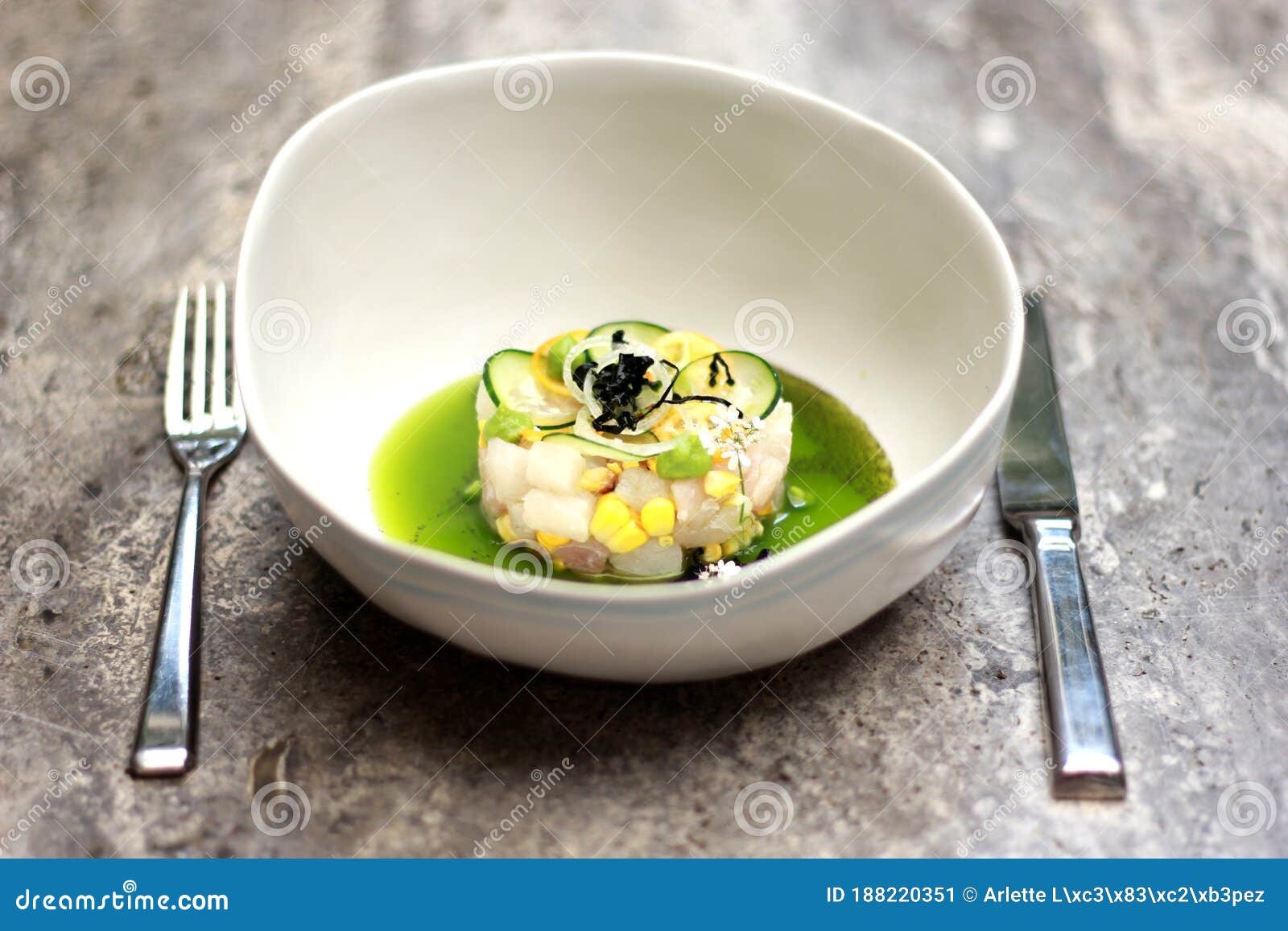 Chef Assembles Gourmet Fish Ceviche Dish with Corn, Cucumber in Green ...