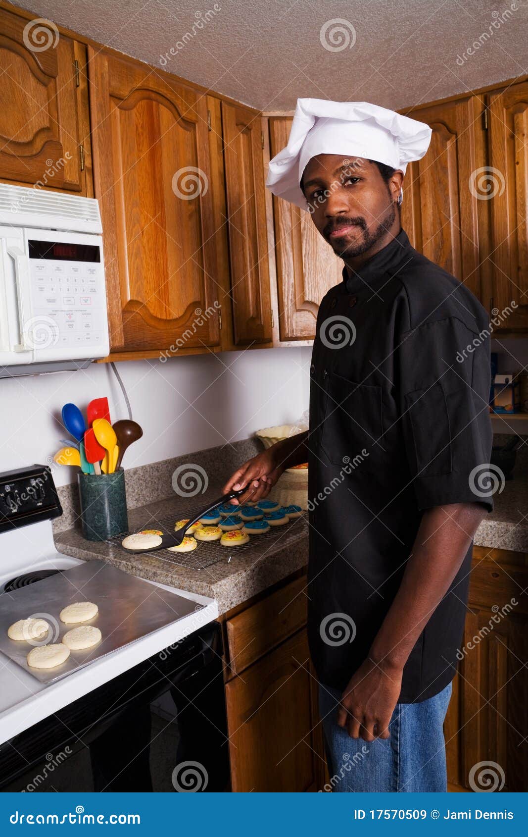 Chef Baking Cookies stock image. Image of chef, young - 17570509