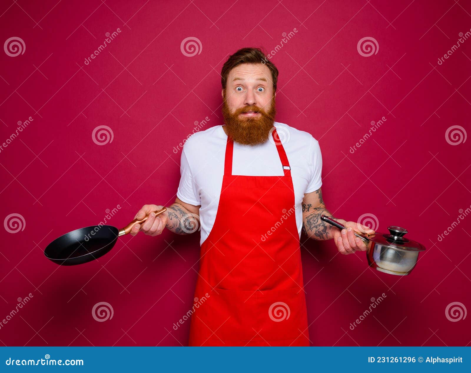Afraid Chef with Beard and Red Apron Cooks with Pan and Pot Stock Photo ...